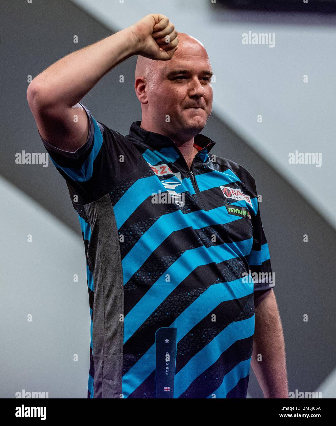 Rob Cross celebrates winning his match against Mervyn King during day ...