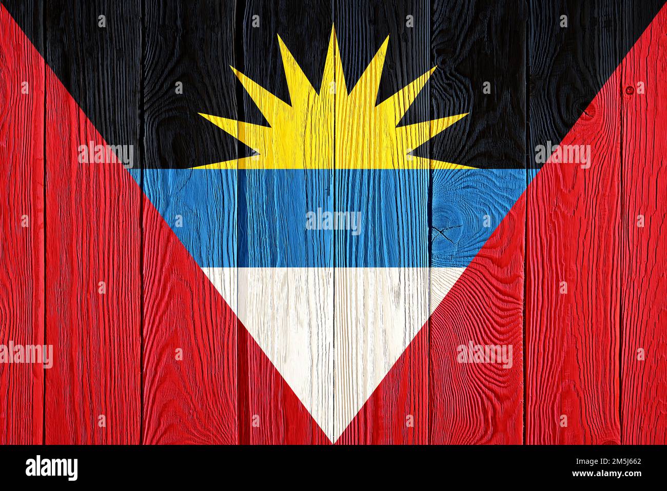Antigua and Barbuda flag painted on old wood plank background. Brushed ...