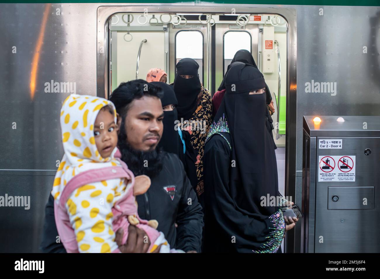 Passengers travel inside a Dhaka Metro train from Uttara North to Agargaon. Prime Minister ...