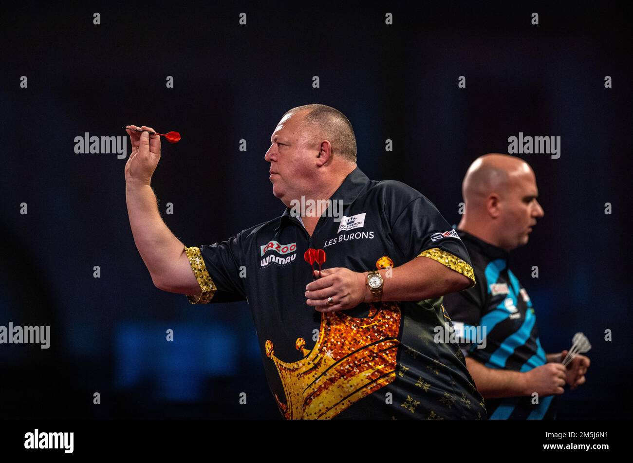 Mervyn King (left) and Rob Cross in action during day twelve of the ...