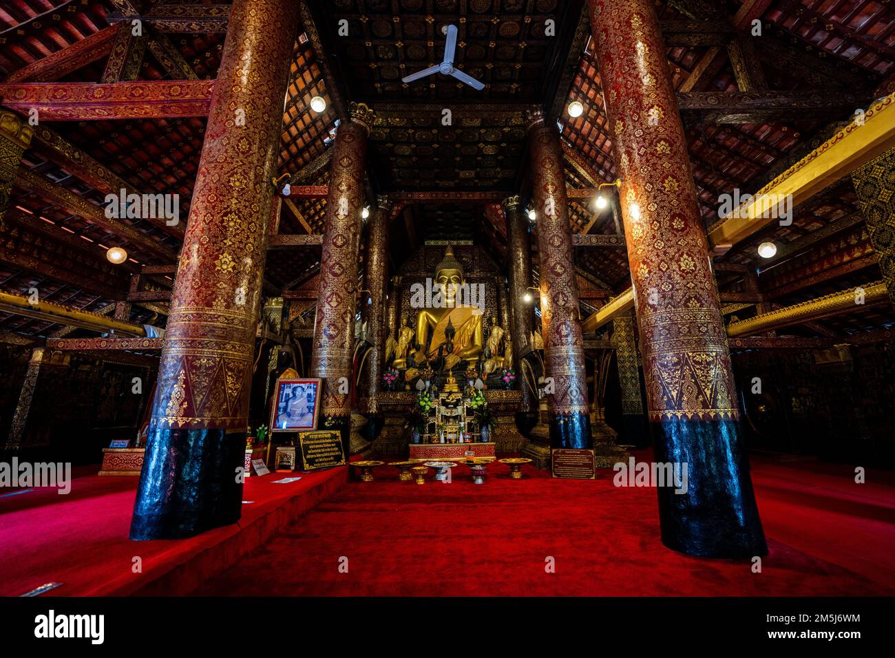A Buddha Statue inside 16th Century Buddhist Temple, Wat Xieng Thong in ...