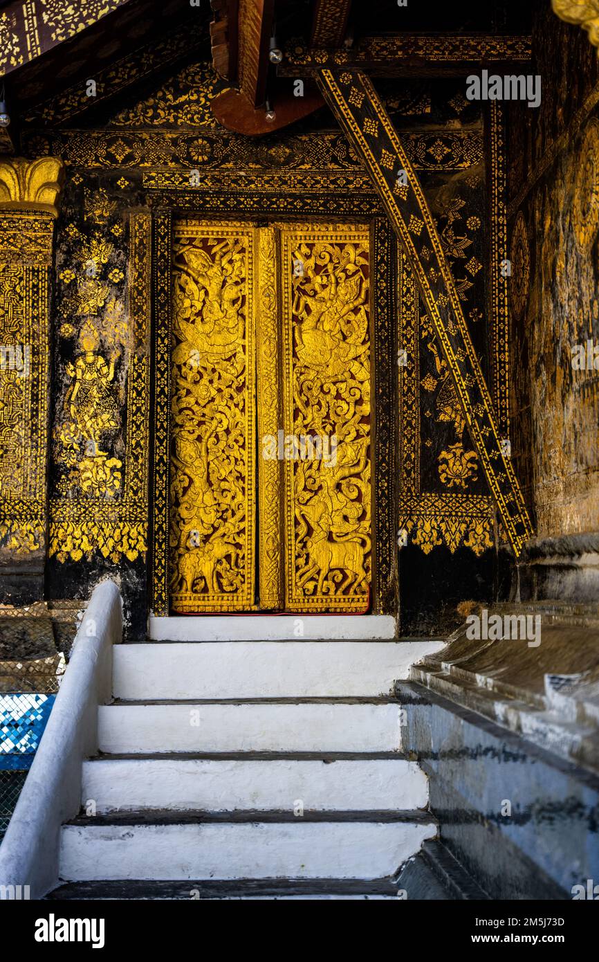 An ornate gold design on door at 16th Century Buddhist Temple, Wat ...