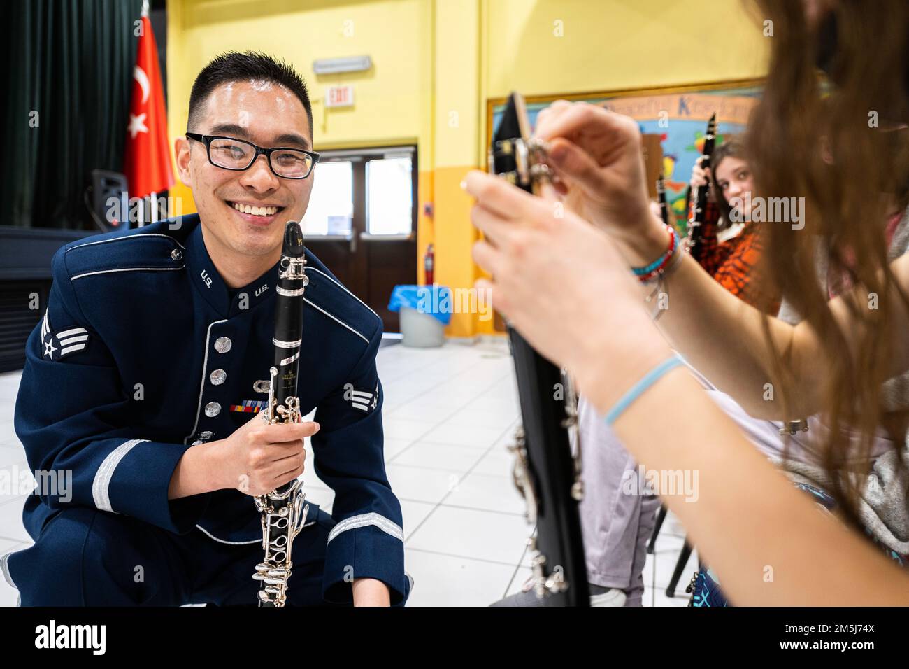 U.S. Air Force Senior Airman Louis Kim, a clarinetist for the Winds ...