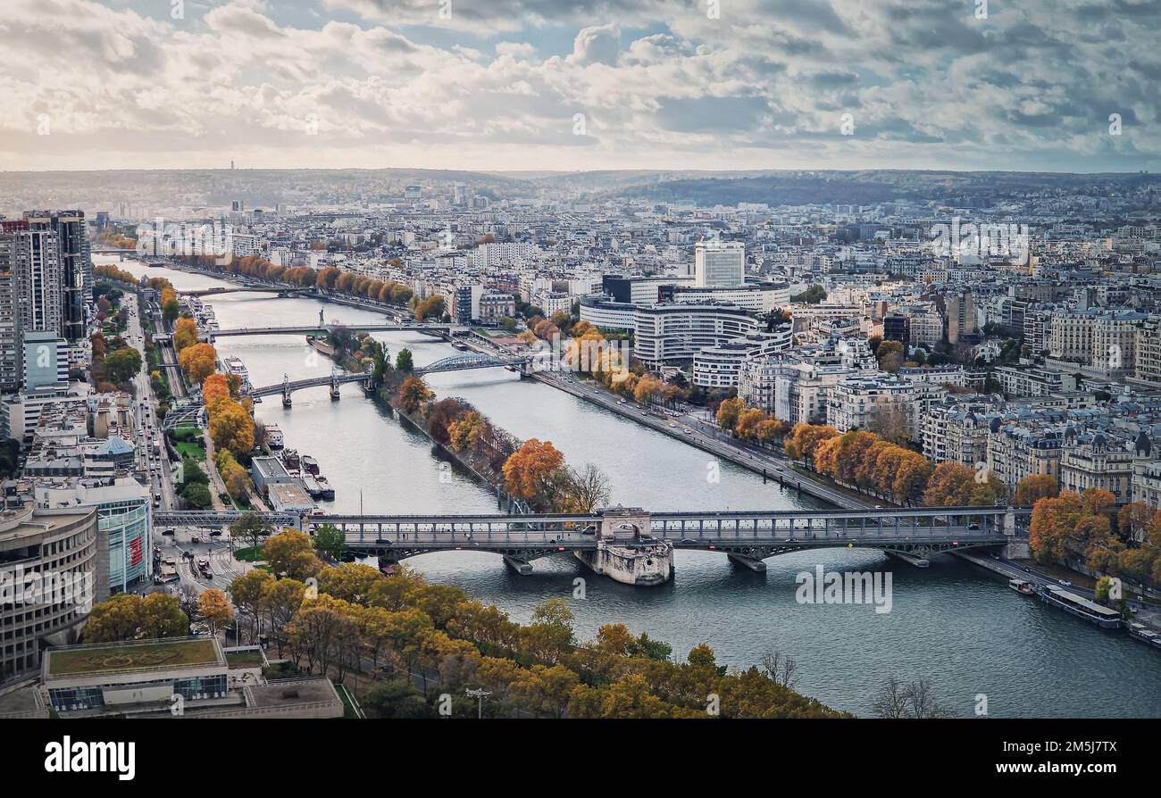 Aerial panorama of Paris city, France. Multiple bridges over the Seine ...