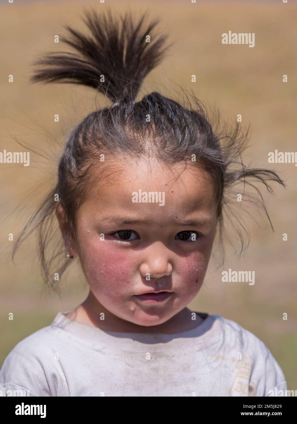 Achik Tash, Kyrgyzstan - 08 29 2019 : Outdoor closeup portrait of ...