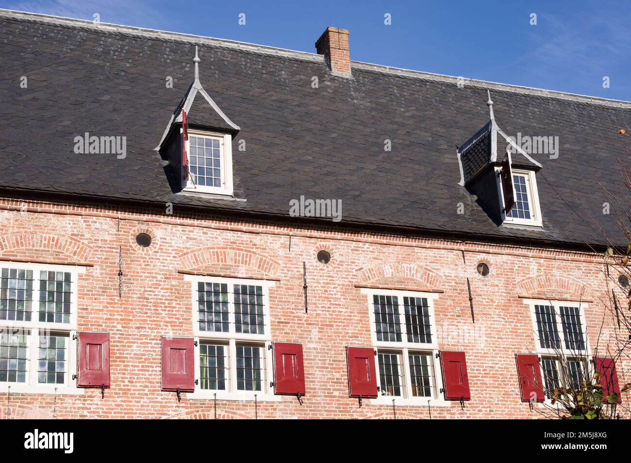 Roof with black roof tiles of medieval house in the center of ...