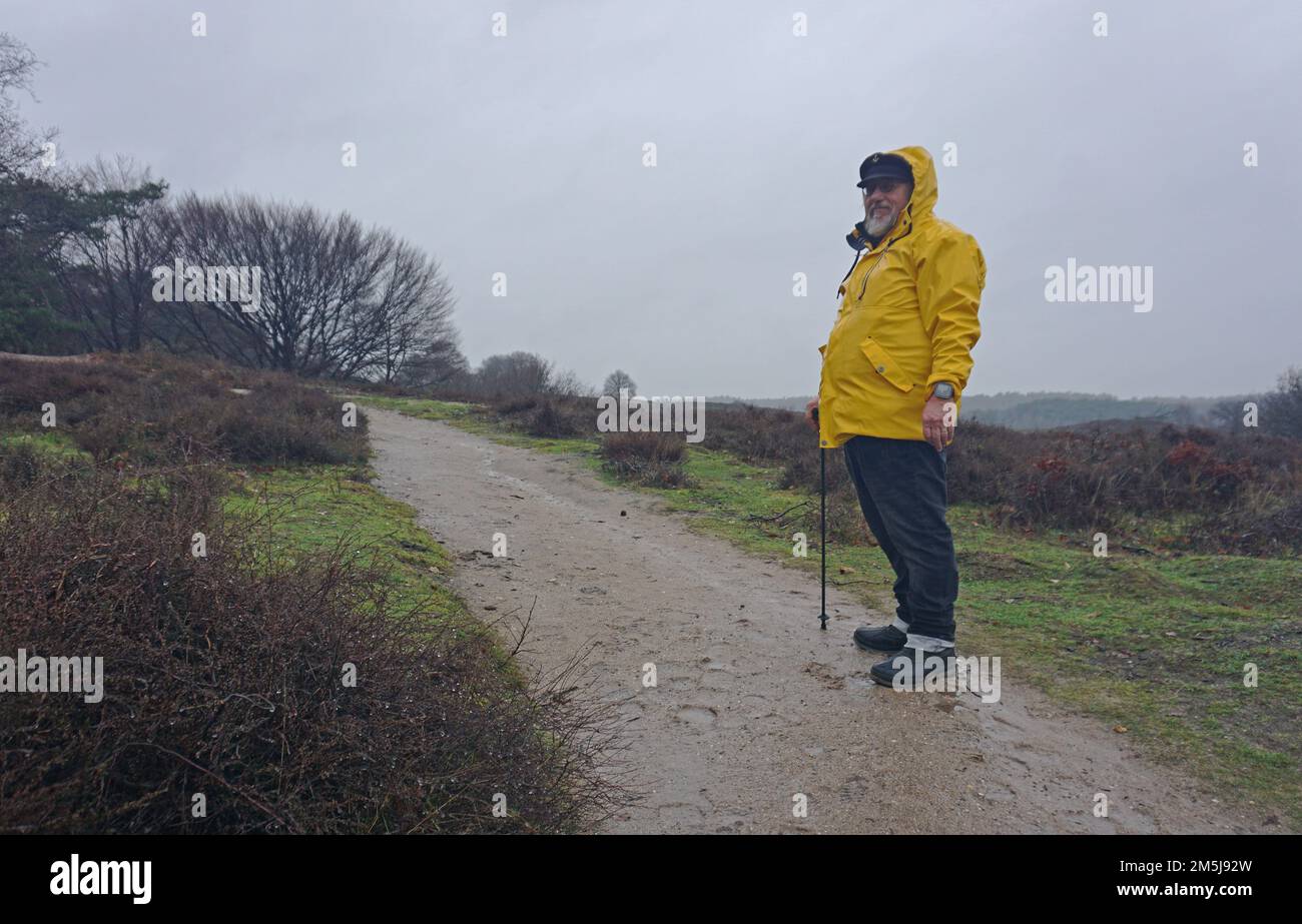 Man yellow raincoat hi-res stock photography and images - Alamy