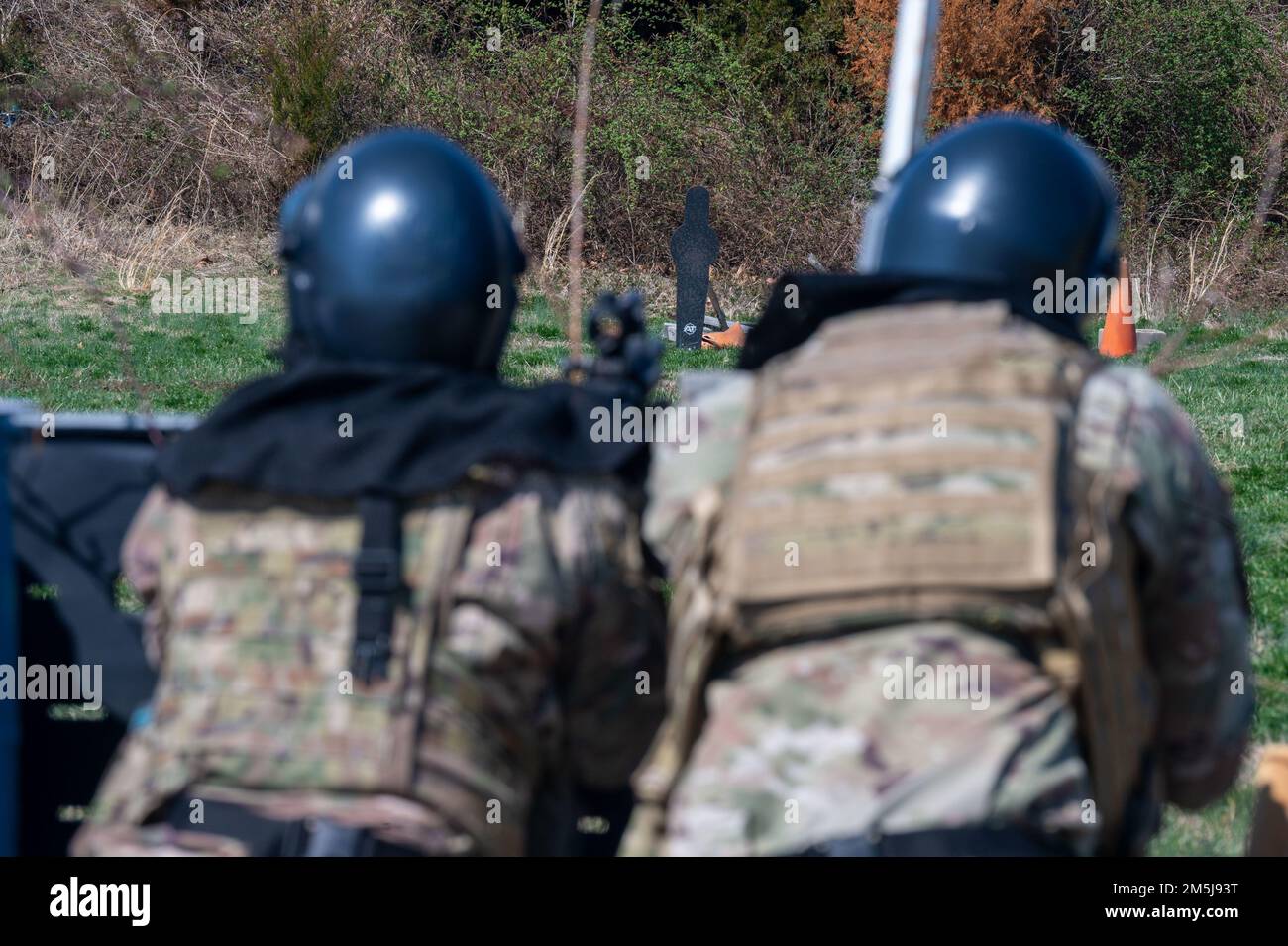 Team Dover Airmen fire simulated rounds at a target during a Tactics ...