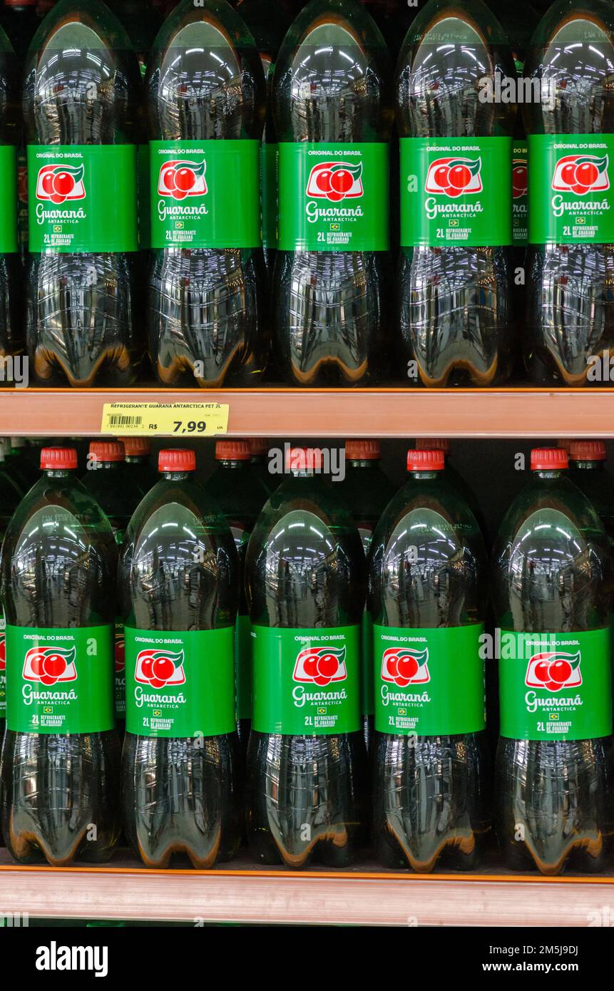 View of shelves full of the bottles of the soft drink Guarana energy ...