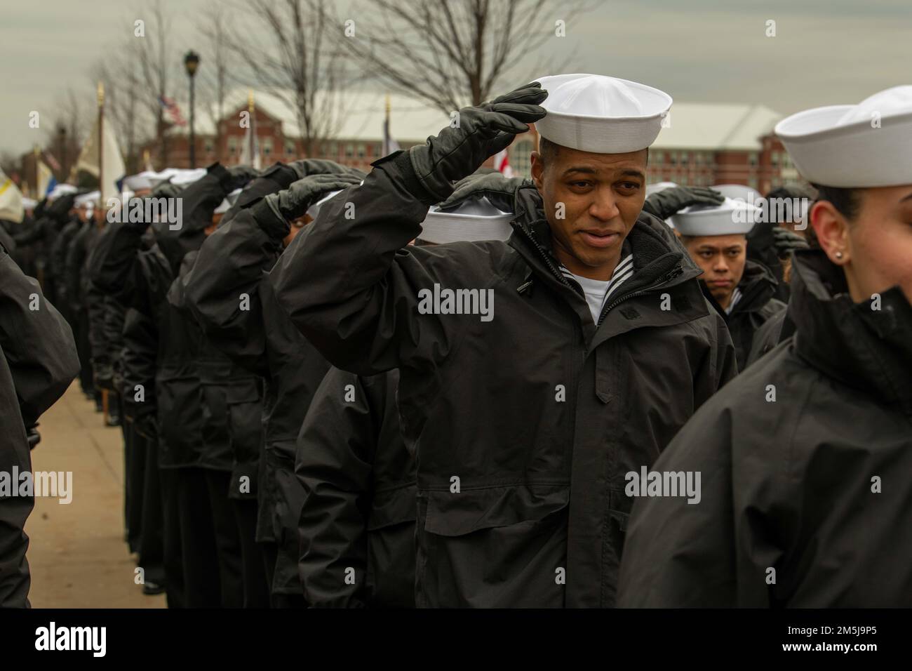 A recruit holds their cover before marching into Midway Ceremonial ...