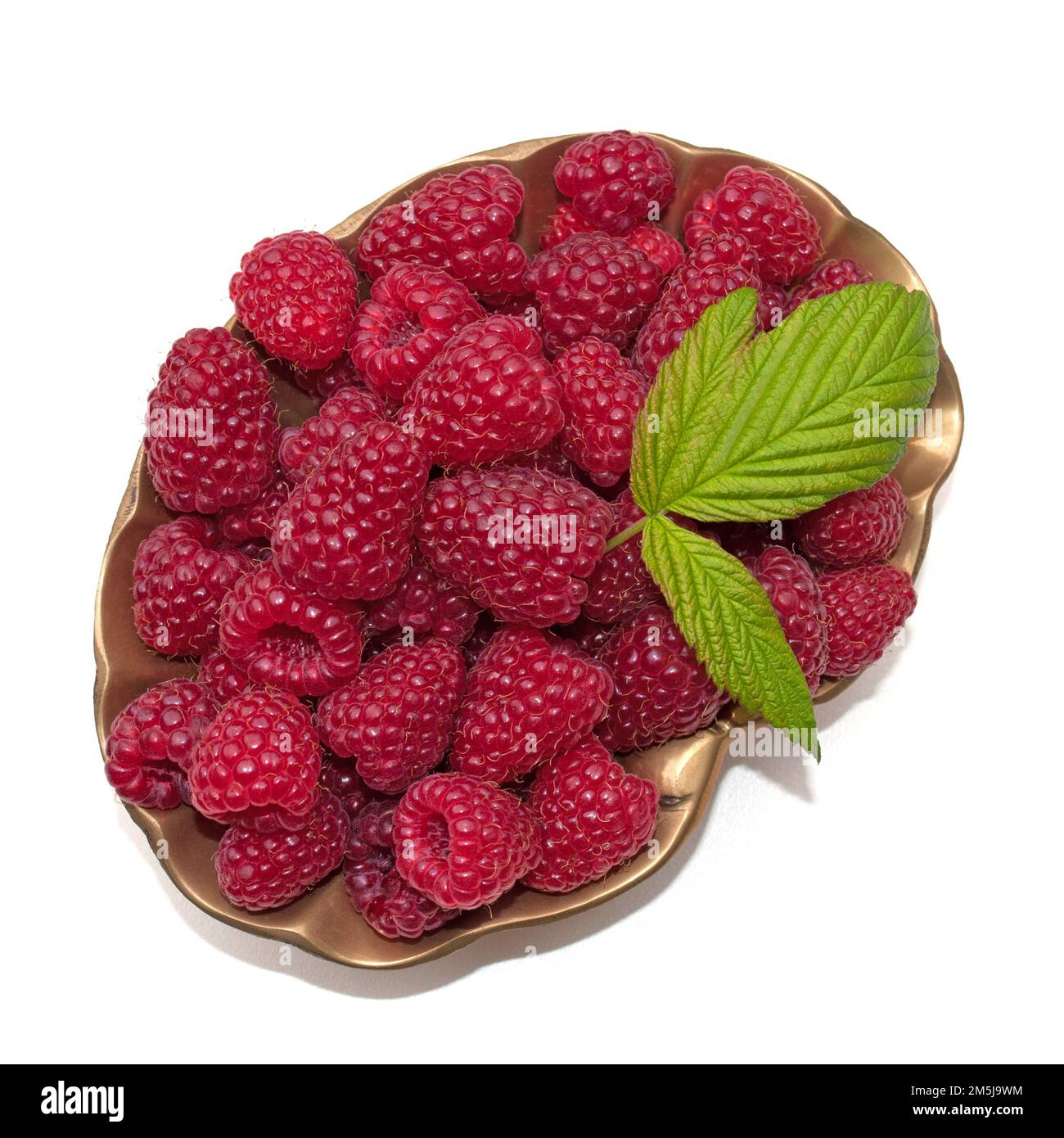 Raspberries isolated against white background Stock Photo - Alamy