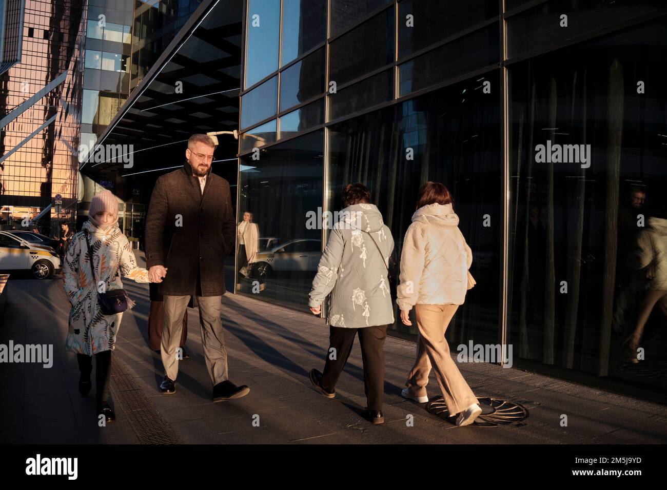 People walk in Moscow International Business Centre (MIBC), also known ...