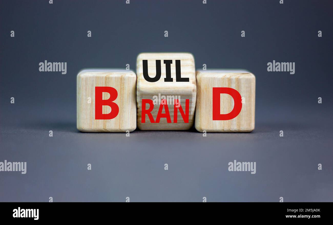 Build your brand symbol. Concept word Build brand on wooden cubes ...
