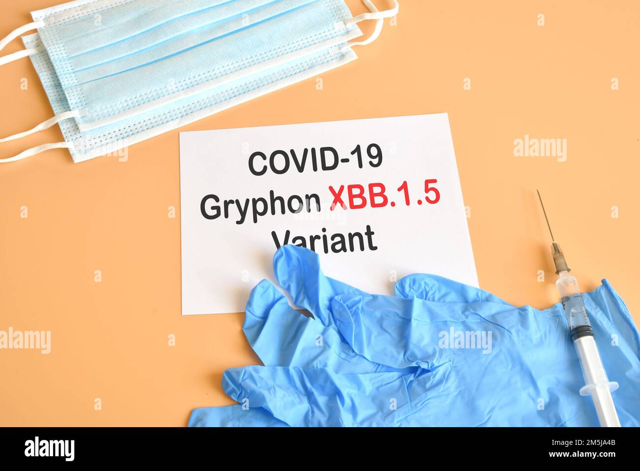 Covid-19 new Gryphon XBB Variant. Syrynge, medical face masks, blue ...