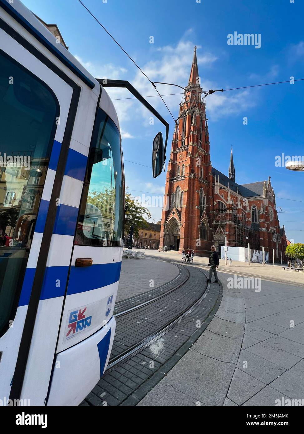 A vertical view of a bus arriving at the Cathedral of St. Peter and St ...