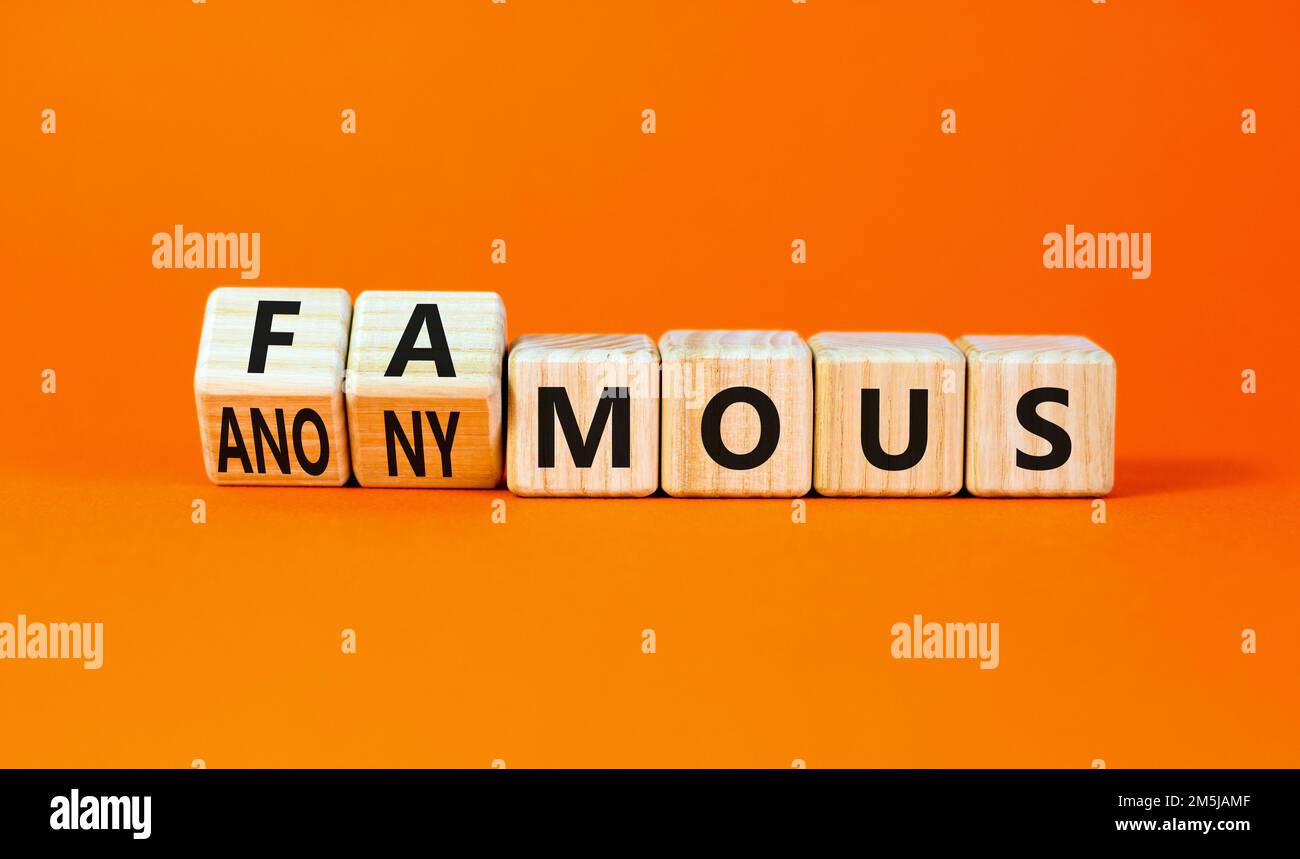 Famous or anonymous symbol. Concept word Famous and Anonymous on wooden ...