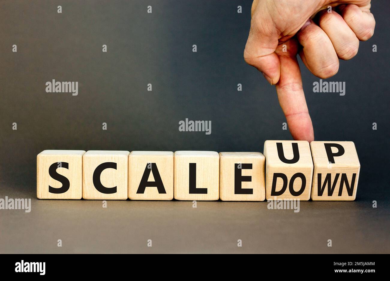 Scale Up Or Down Symbol Concept Words Scale Up Scale Down Wooden Cubes Businessman Hand