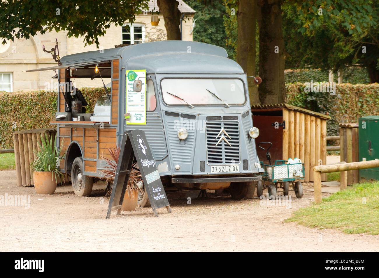 vintage grey corrugated citroen H van operating as a pop up cafe at ...