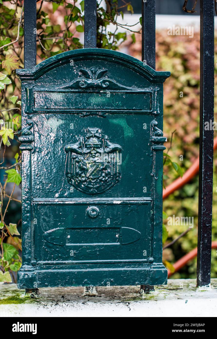 metal letter box hung on metal frame Stock Photo - Alamy