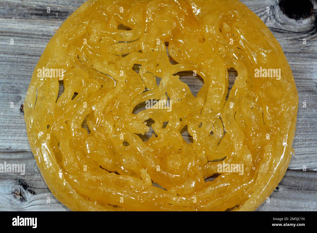 Egyptian Meshabek, It is a rounded sweet made of a deep-fried crunchy ...