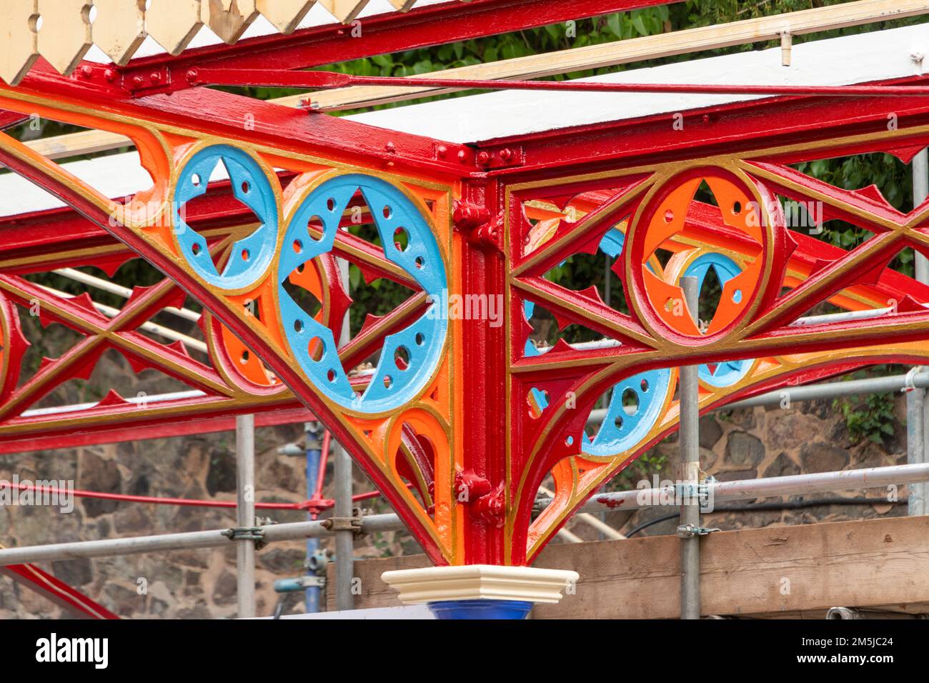 detail of ornate victorian wrought iron roof bracket newly renovated ...