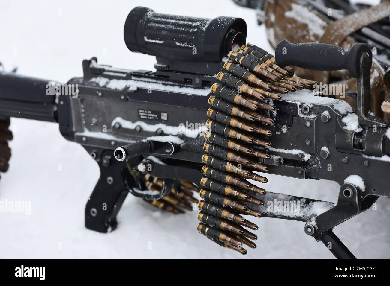 Tools of the trade: A snowy M-240B sits ready for action March 19, 2022 ...