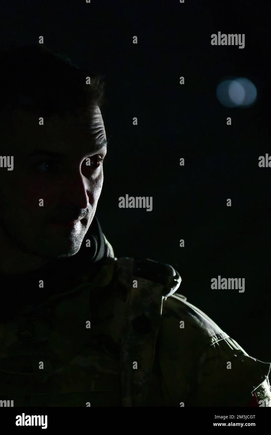 Working inside a massive, dark tent, large enough to house a Stryker ...