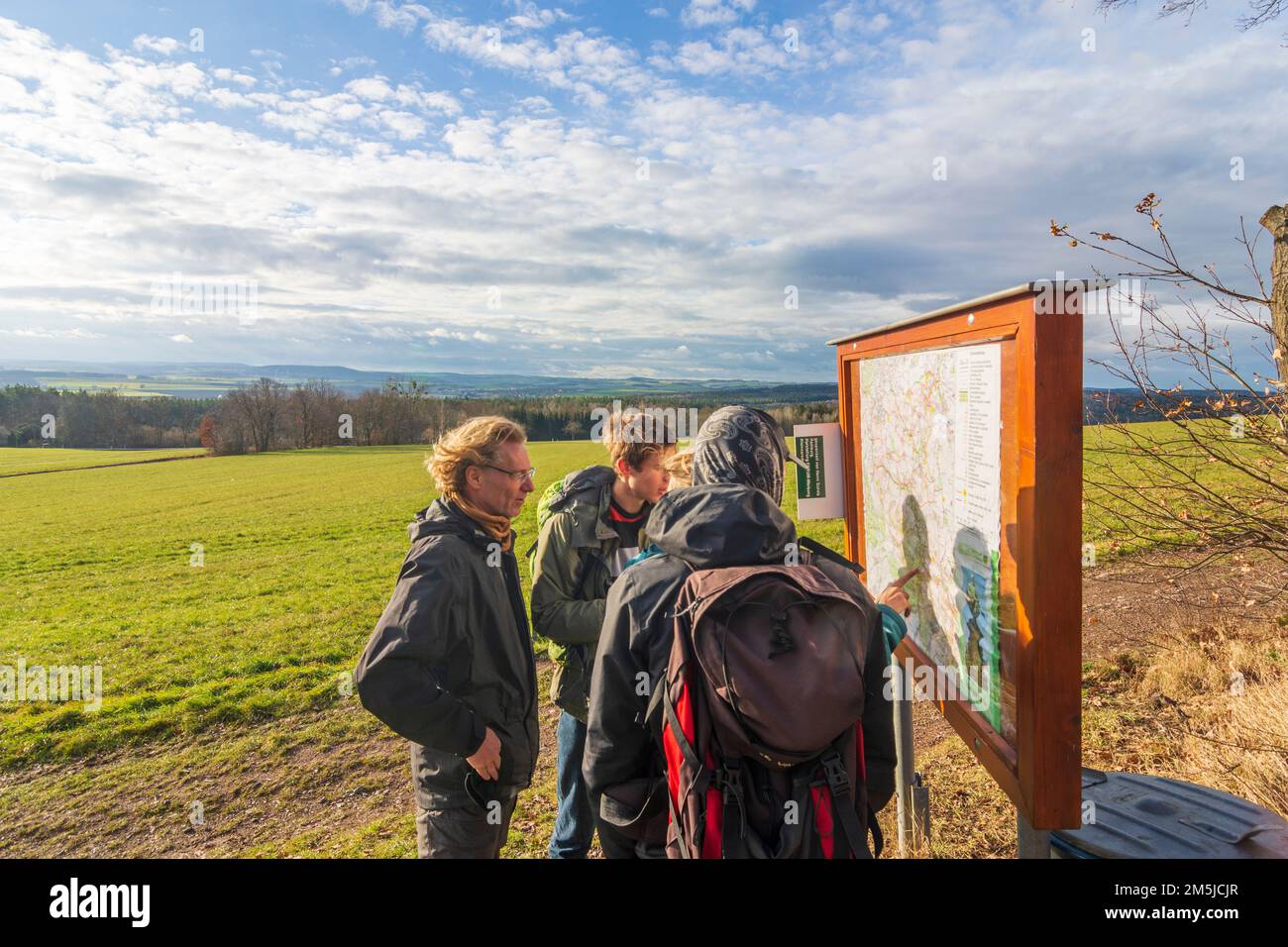 Kreischa: mountain Quohrener Kipse, hiker at hiking map board in ...