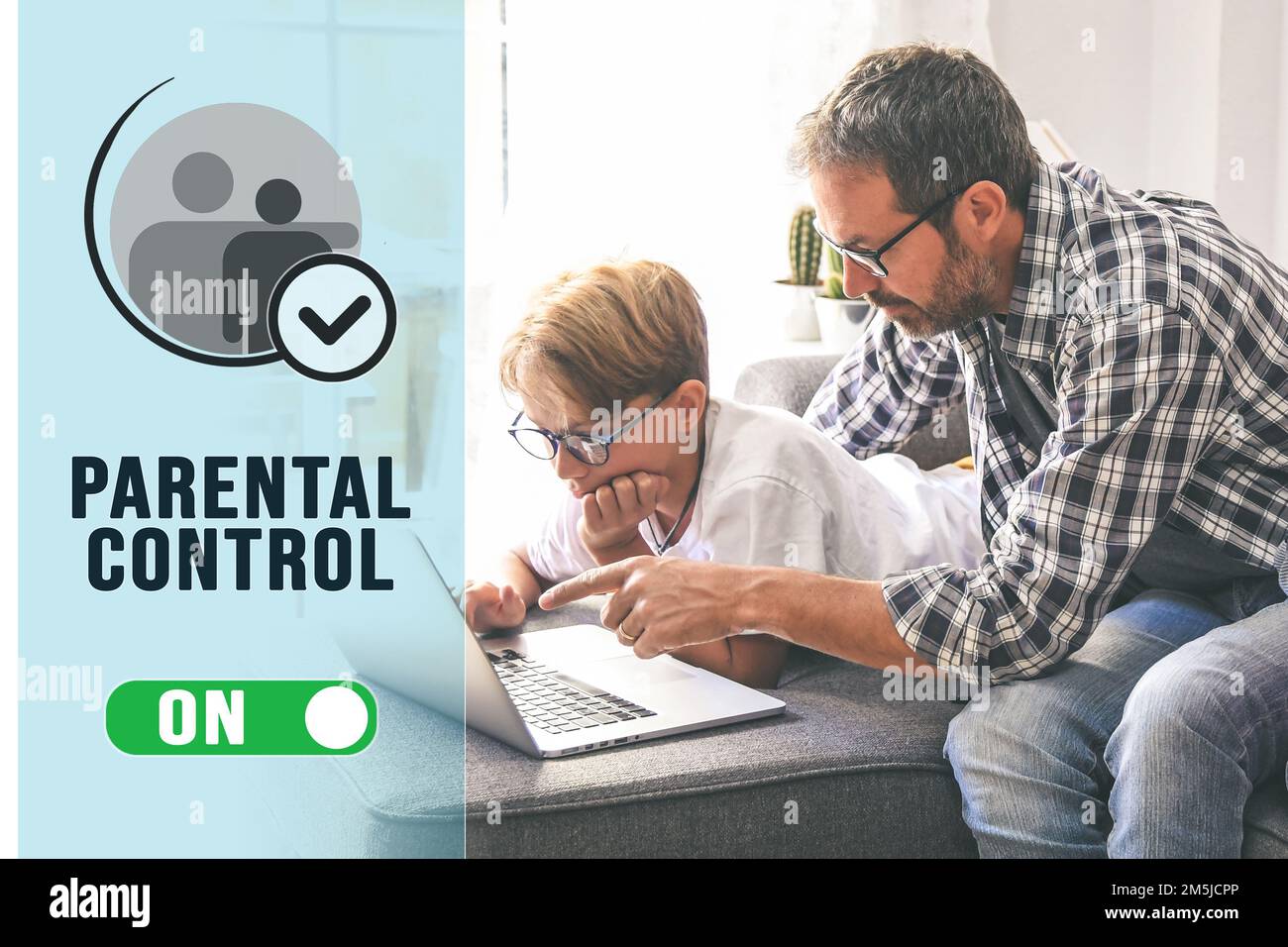 Parental control and child protection concept. Boy and dad typing on ...