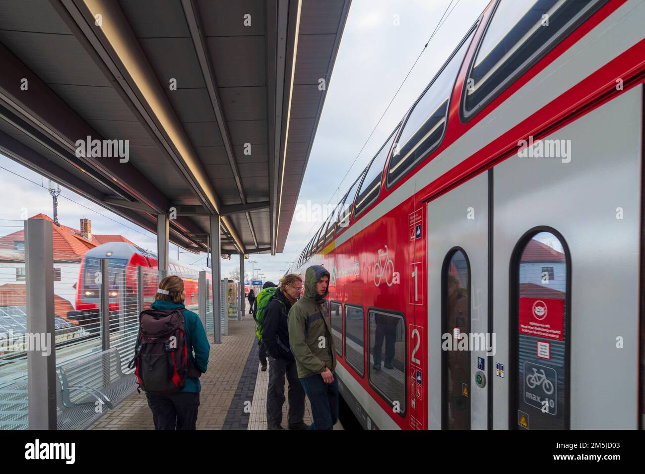 Dresden: passengers at platform entering S-Bahn train in , Sachsen ...