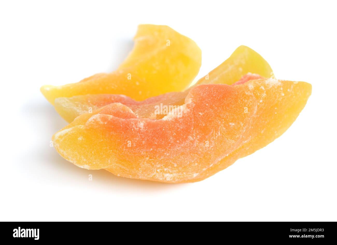 Dried melon with sugar isolated on white background Stock Photo - Alamy