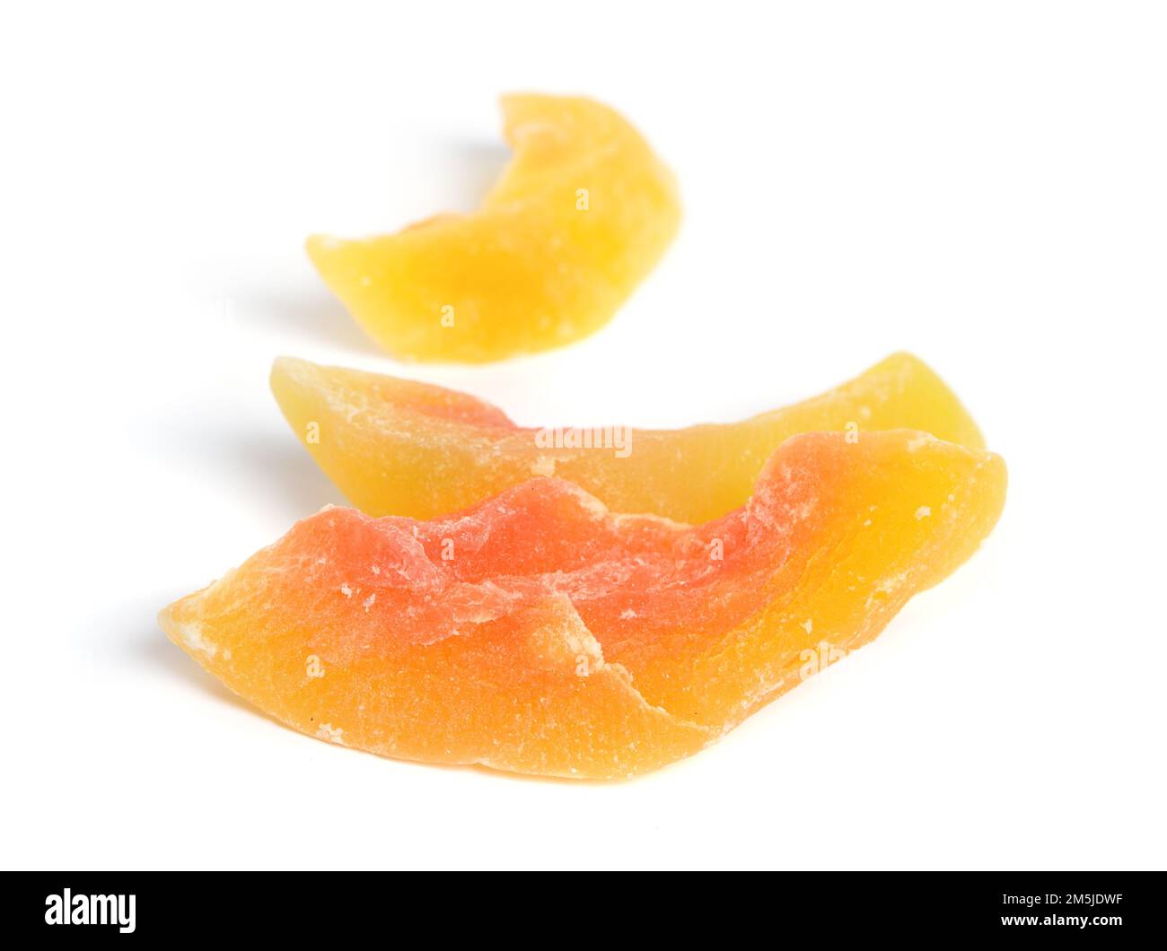 Dried melon with sugar isolated on white background Stock Photo - Alamy