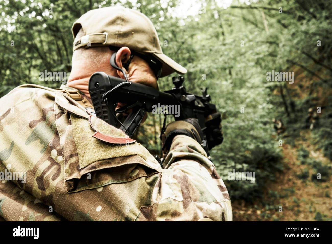 young soldiers in action on the battlefield Stock Photo - Alamy