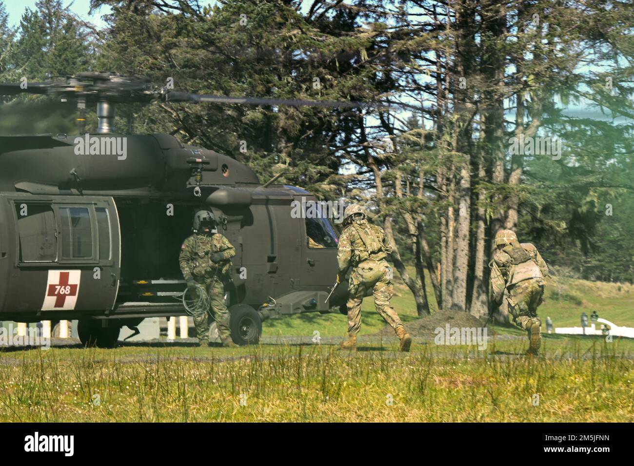 Oregon Army National Guard Soldiers move toward a UH-60 Black hawk ...