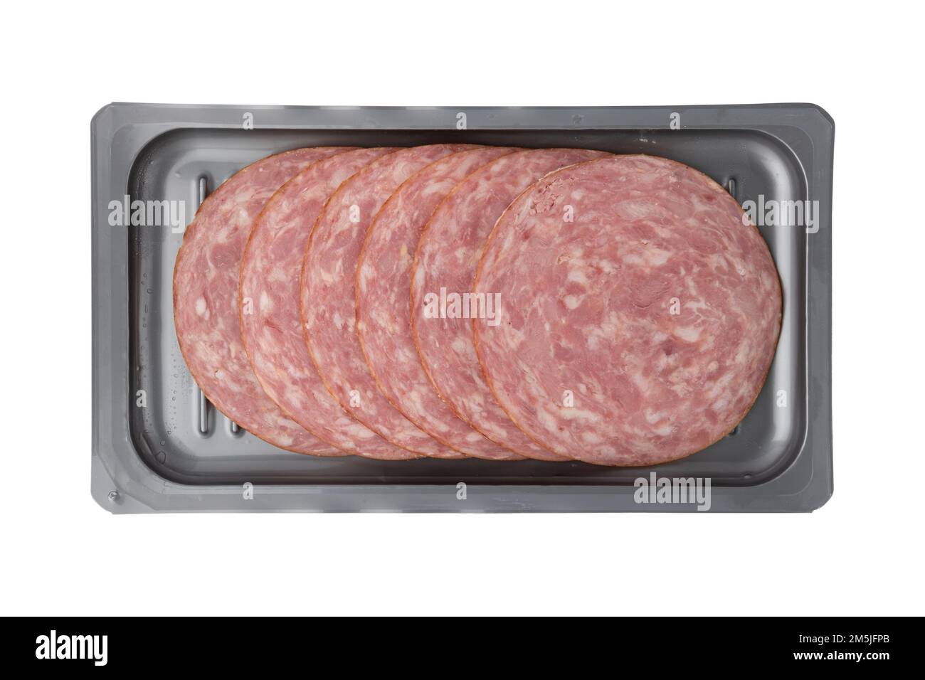 ham cut into pieces isolated on white background, sliced ham in plastic ...