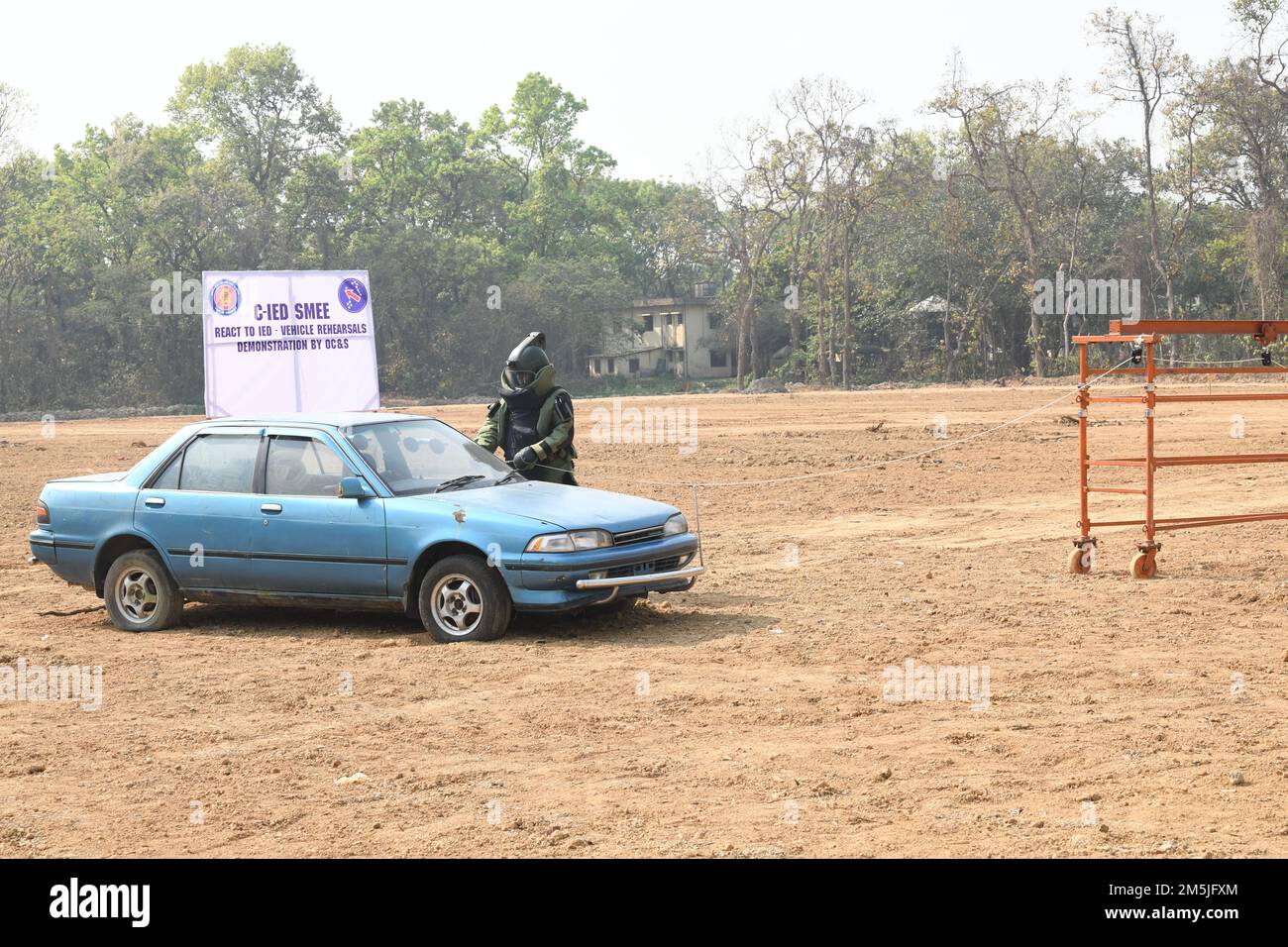 A Bangladeshi Explosive Ordnance Disposal (EOD) Technician prepares to ...