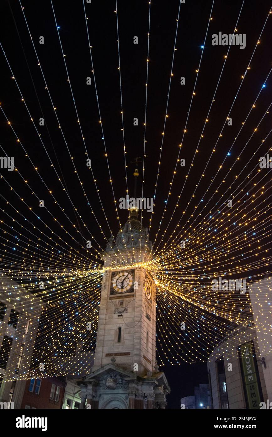 Festive Decorations on Brighton's Clock Tower Stock Photo - Alamy