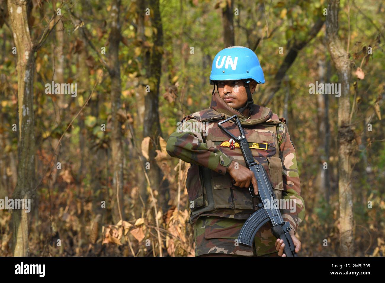 A Bangladeshi Army soldier performs a roadside sweep for any other ...