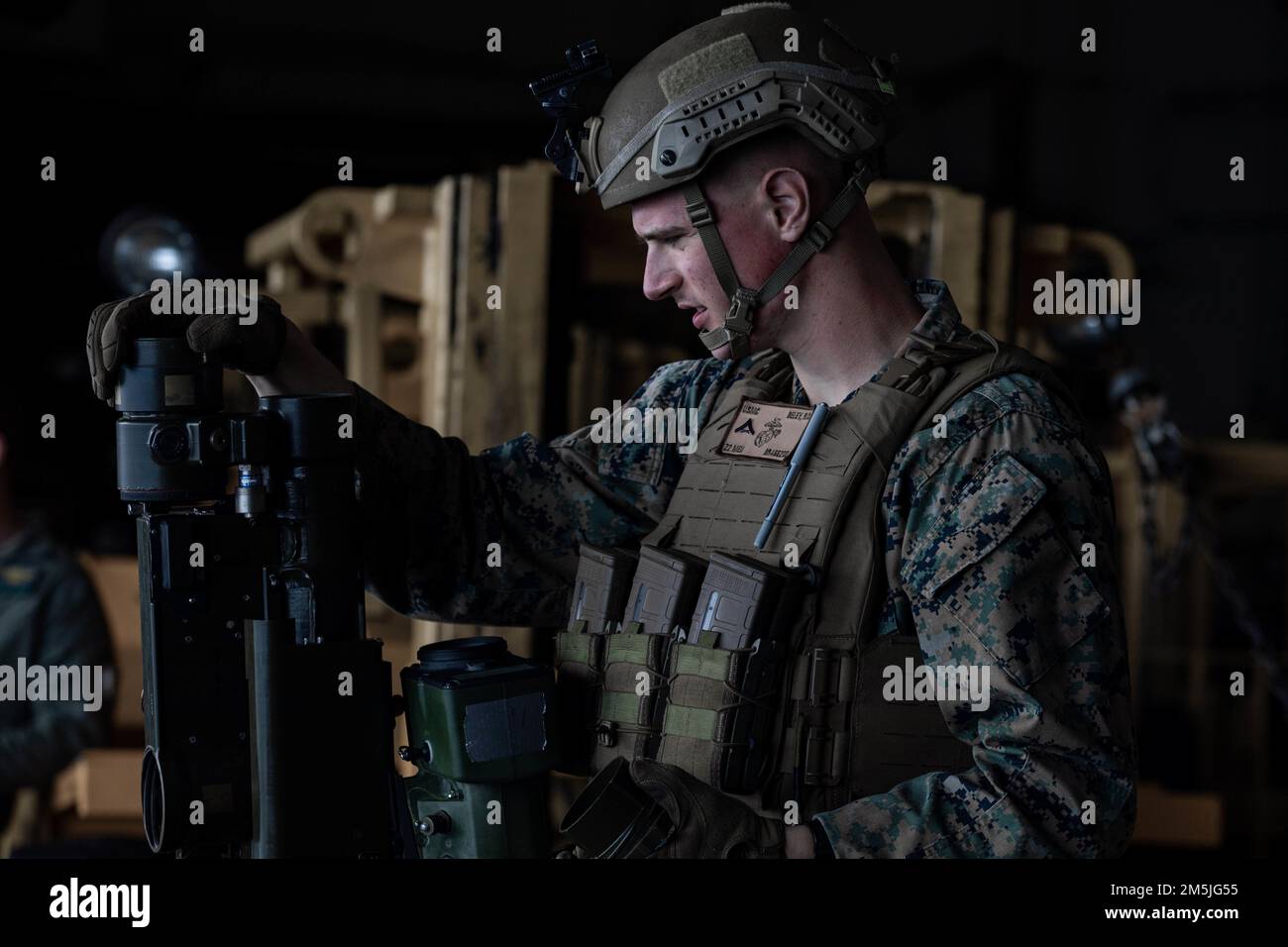 U.S. Marine Lance Cpl. Romig Beley, a low altitude air defense gunner ...