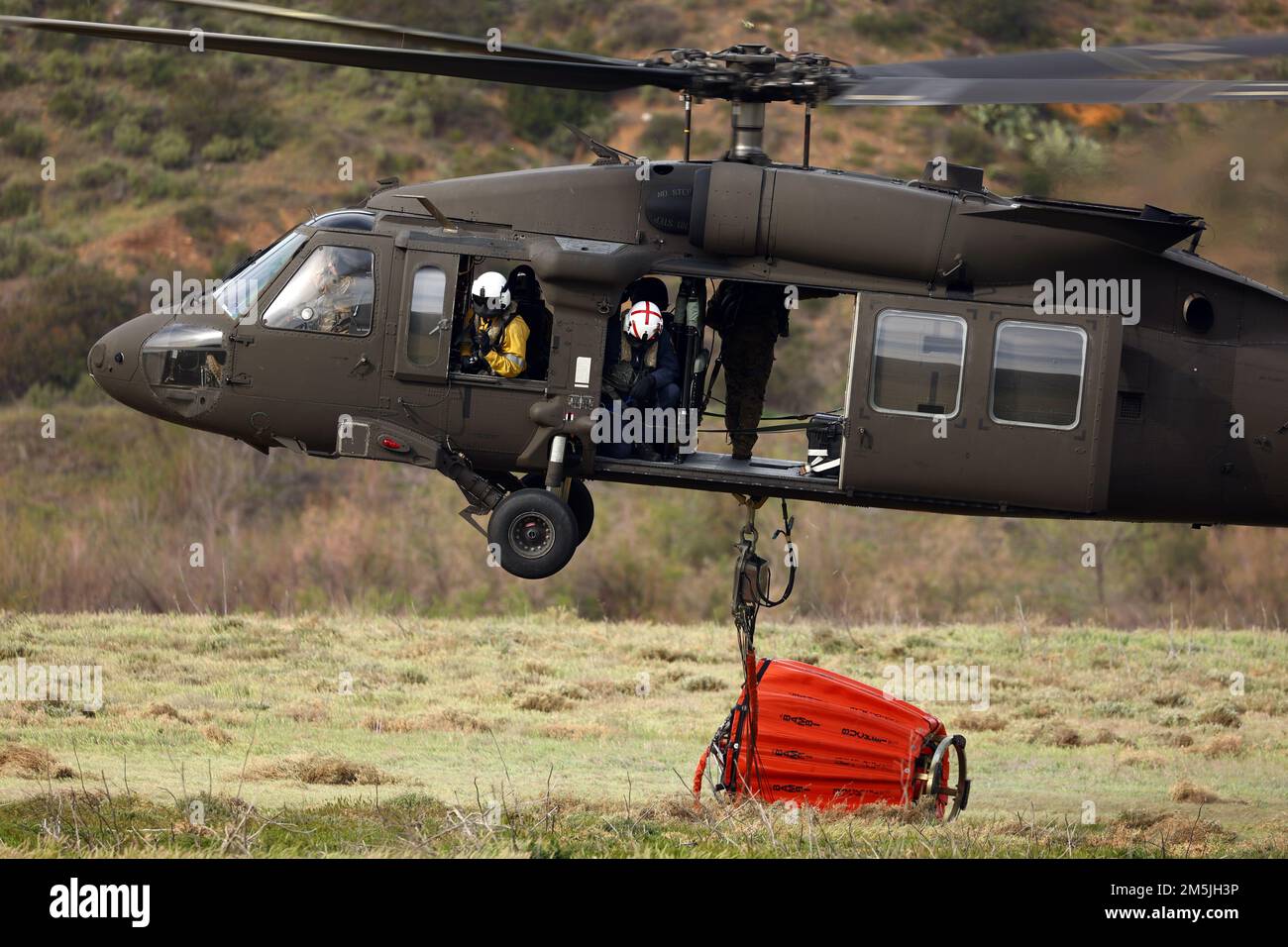 A U.S. Army UH-60M Black Hawk helicopter flown by Soldiers from the 1st ...