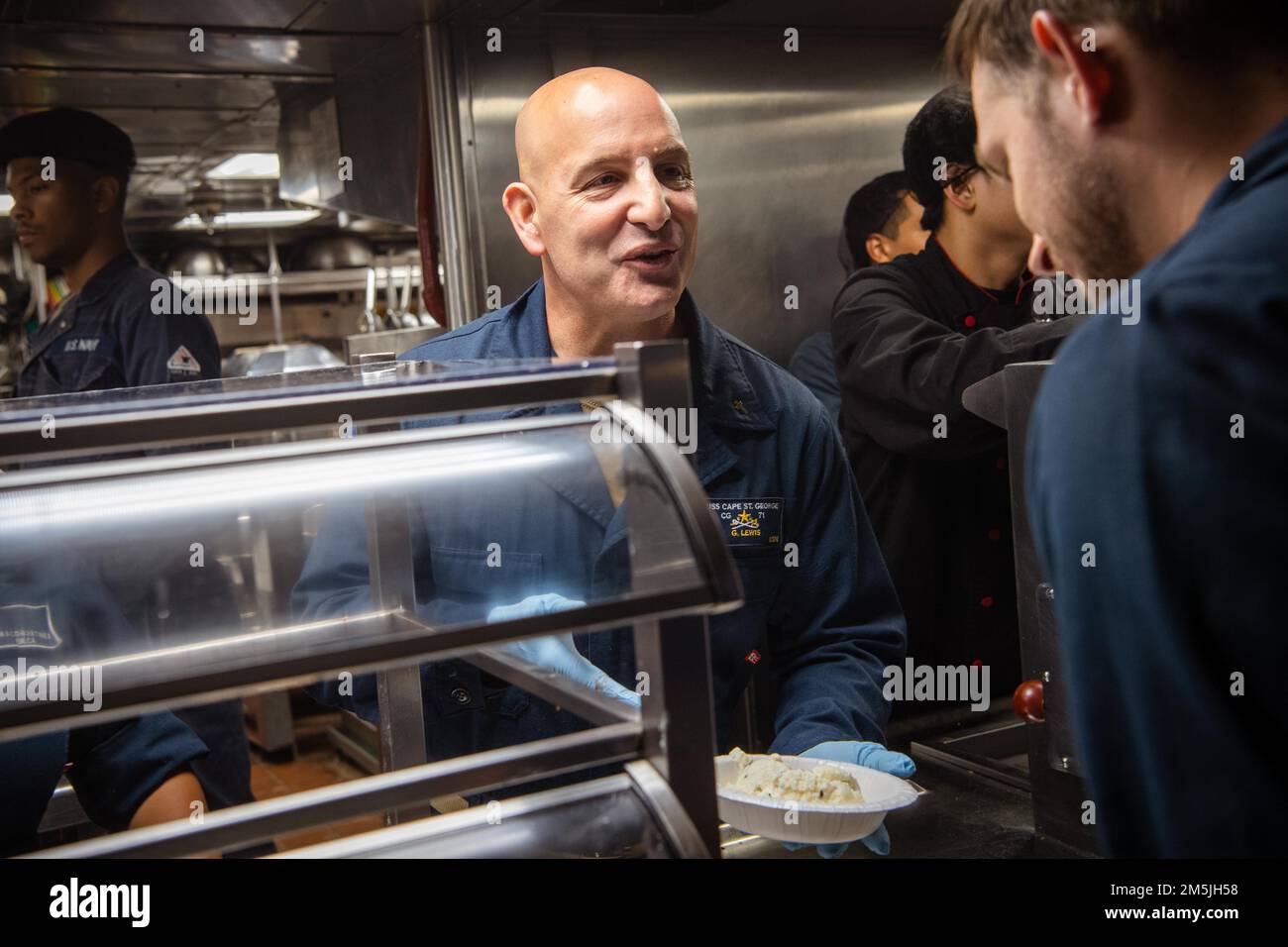 220319-N-TT059-2072 SOUTH CHINA SEA (Mar. 19, 2022) Lt. Gary Lewis, a ...