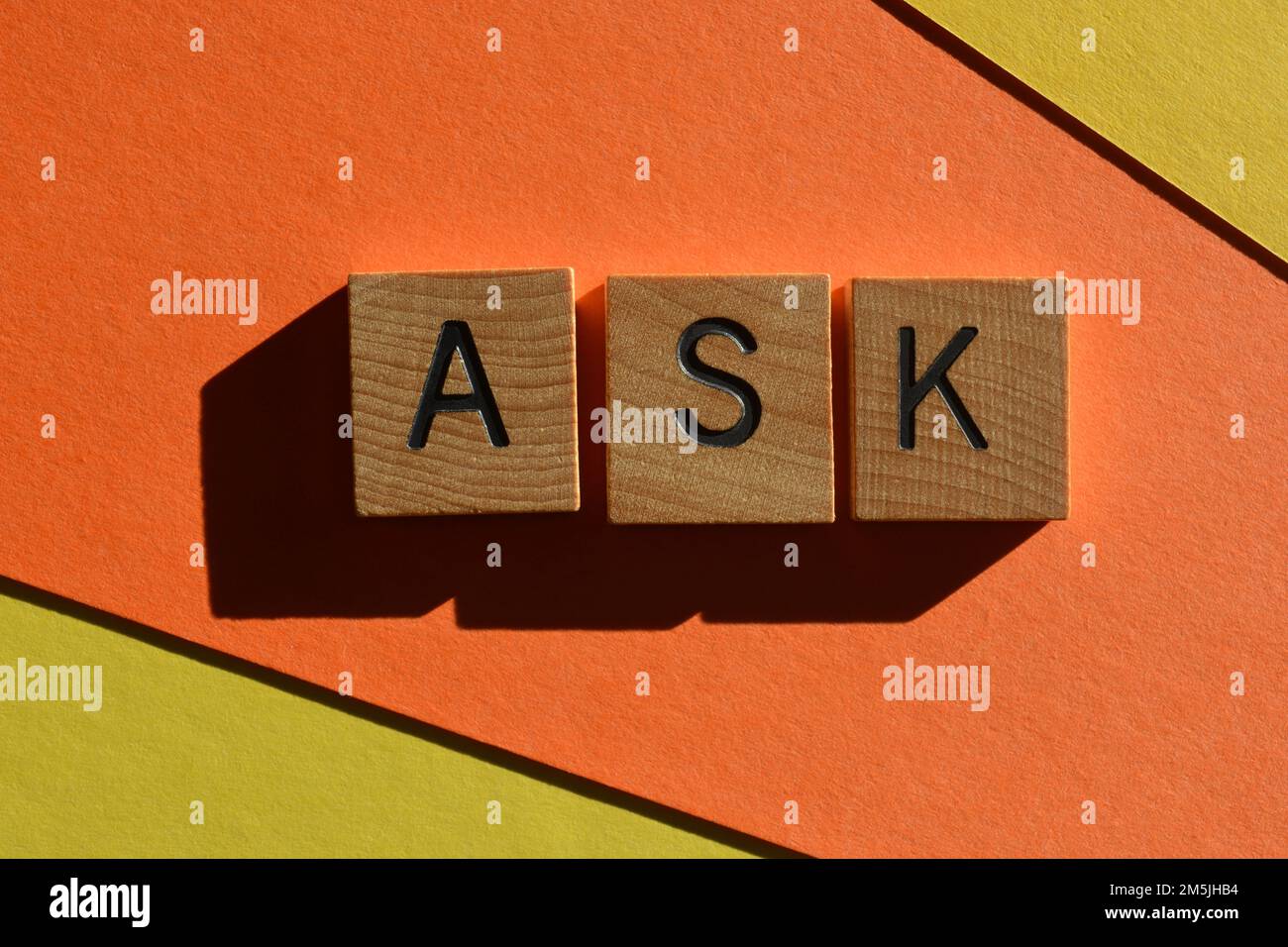 ASK, business acronym for Ability, Skills, Knowledge in wooden alphabet ...