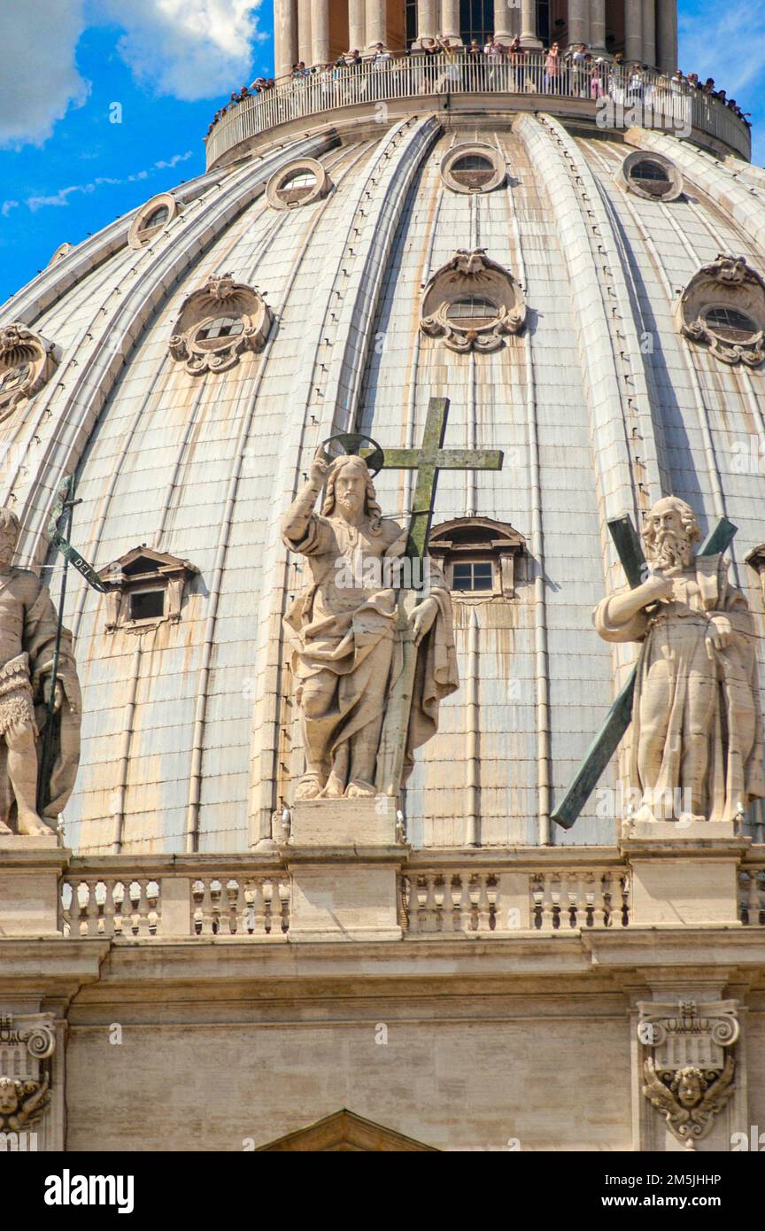St. Peter's Basilica Cathedral's dome with close-up of statue of Jesus ...