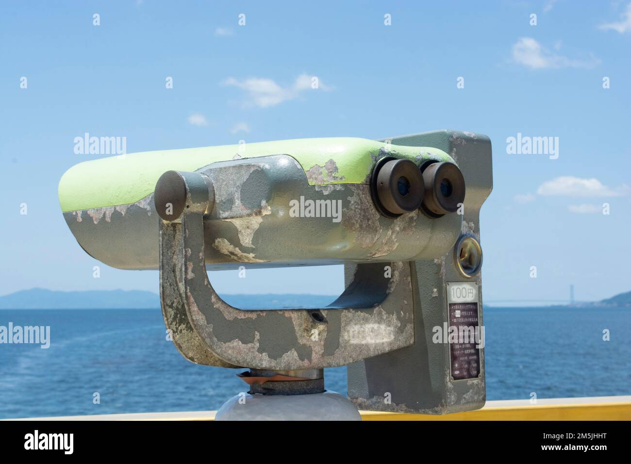 Sightseeing binoculars - telescope on sea tour ship Stock Photo - Alamy