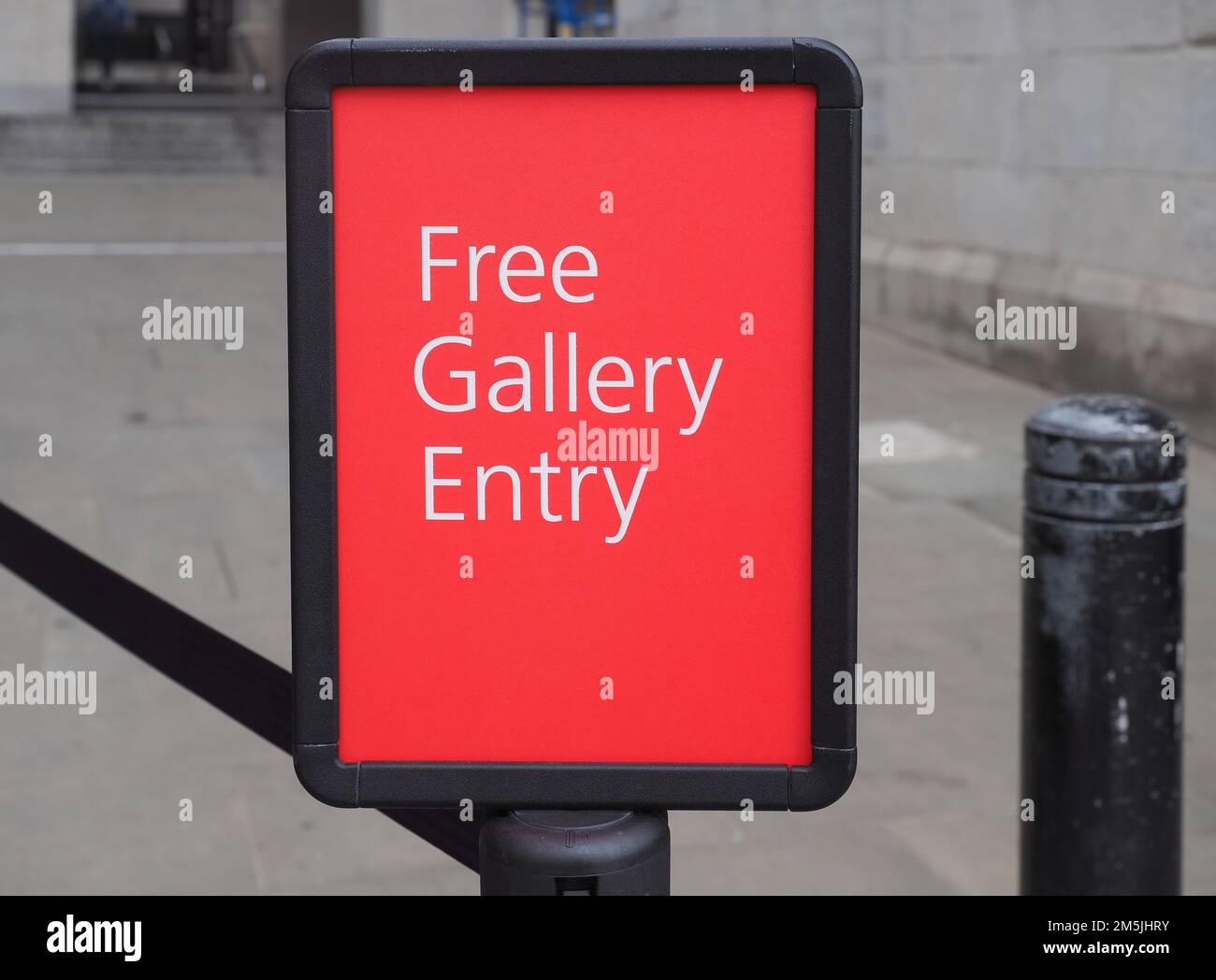 free gallery entry sign white over red background Stock Photo - Alamy