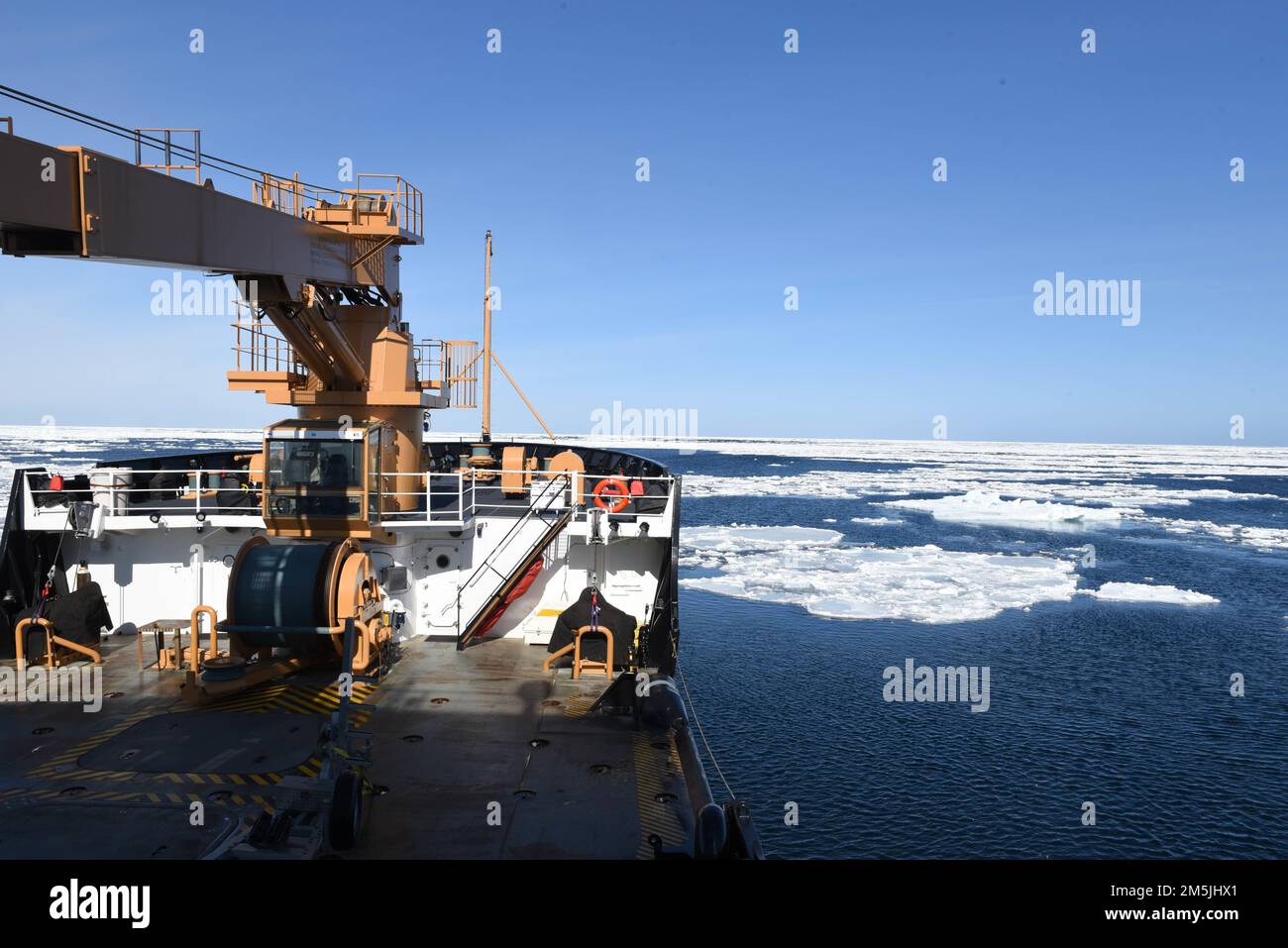 U.S. Coast Guard Cutter Spar transits over ice in the Gulf of the St ...