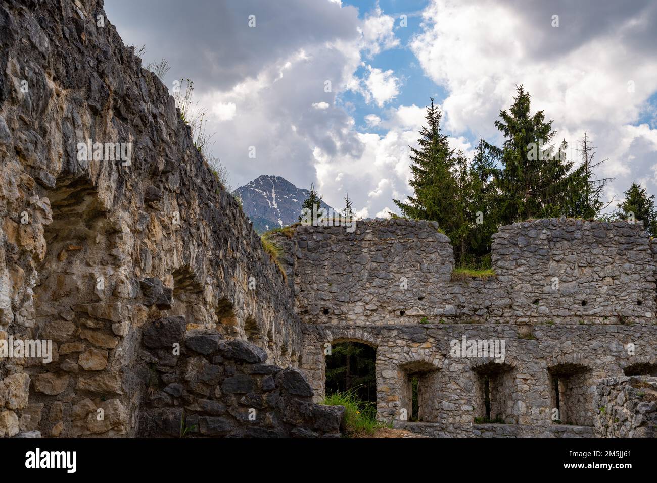Natural stone walls of the ruins of Fort Claudia in the mountains ...