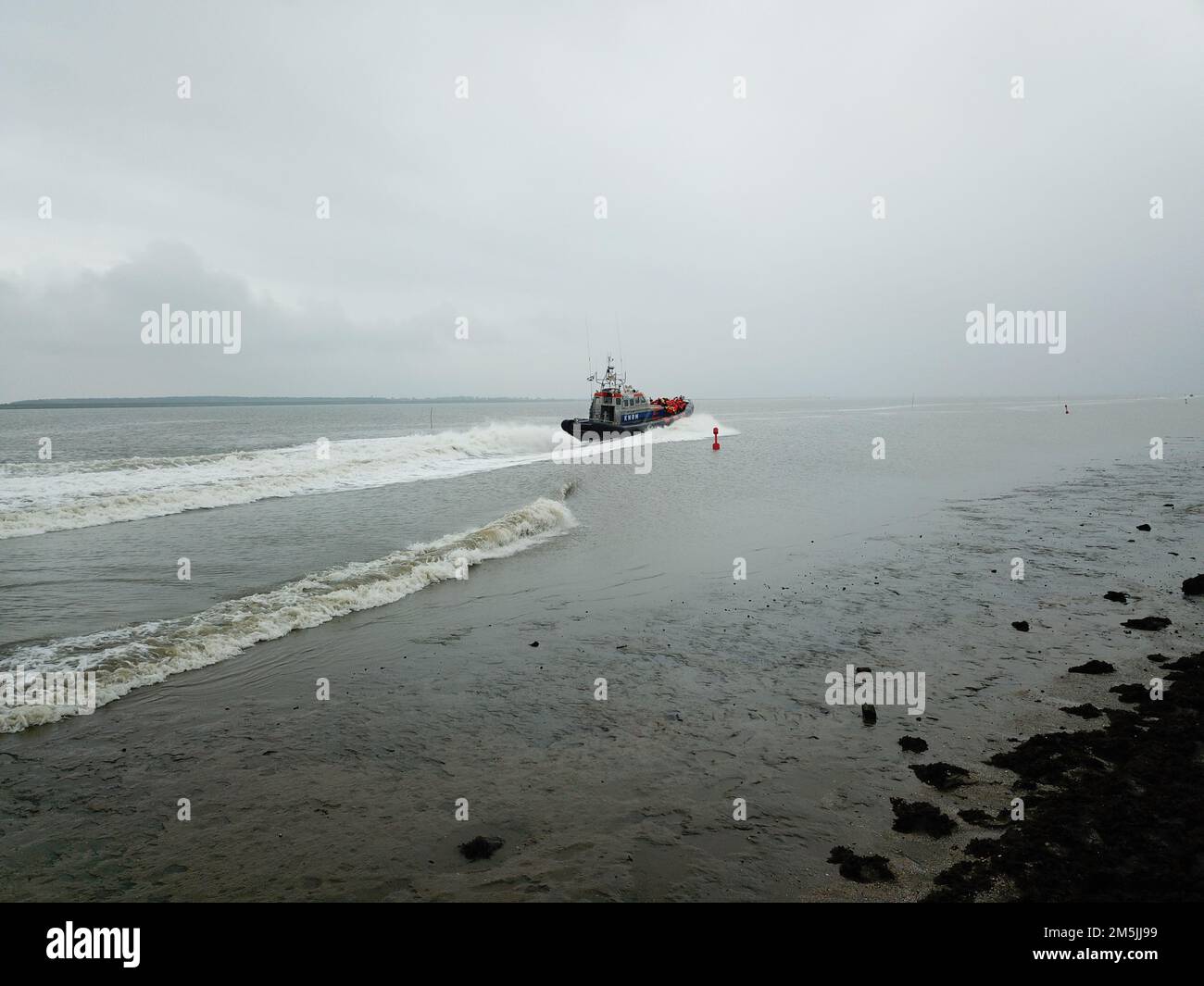 The lifeguard boat driving towards the sea in the Netherlands Stock ...