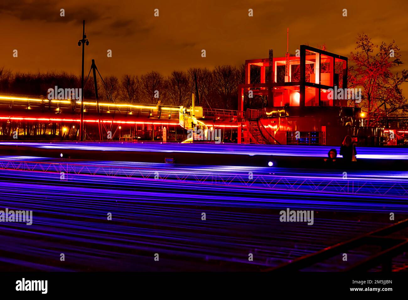 Paris, France. 25th Dec, 2022. Aftereal, moving threads and UV light ...