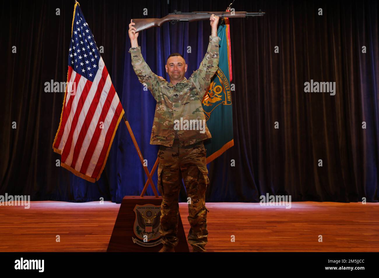 Sgt. 1st Class Timothy Russell poses for a photo during an awards ...